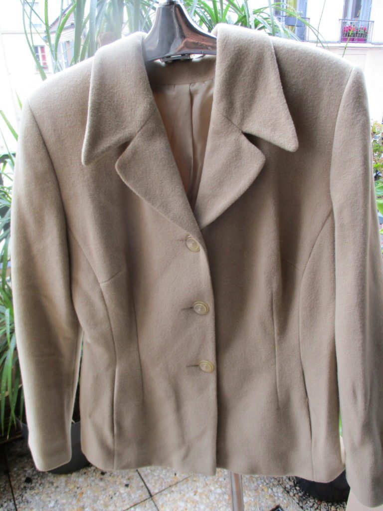 Tailored beige jacket with wide collar